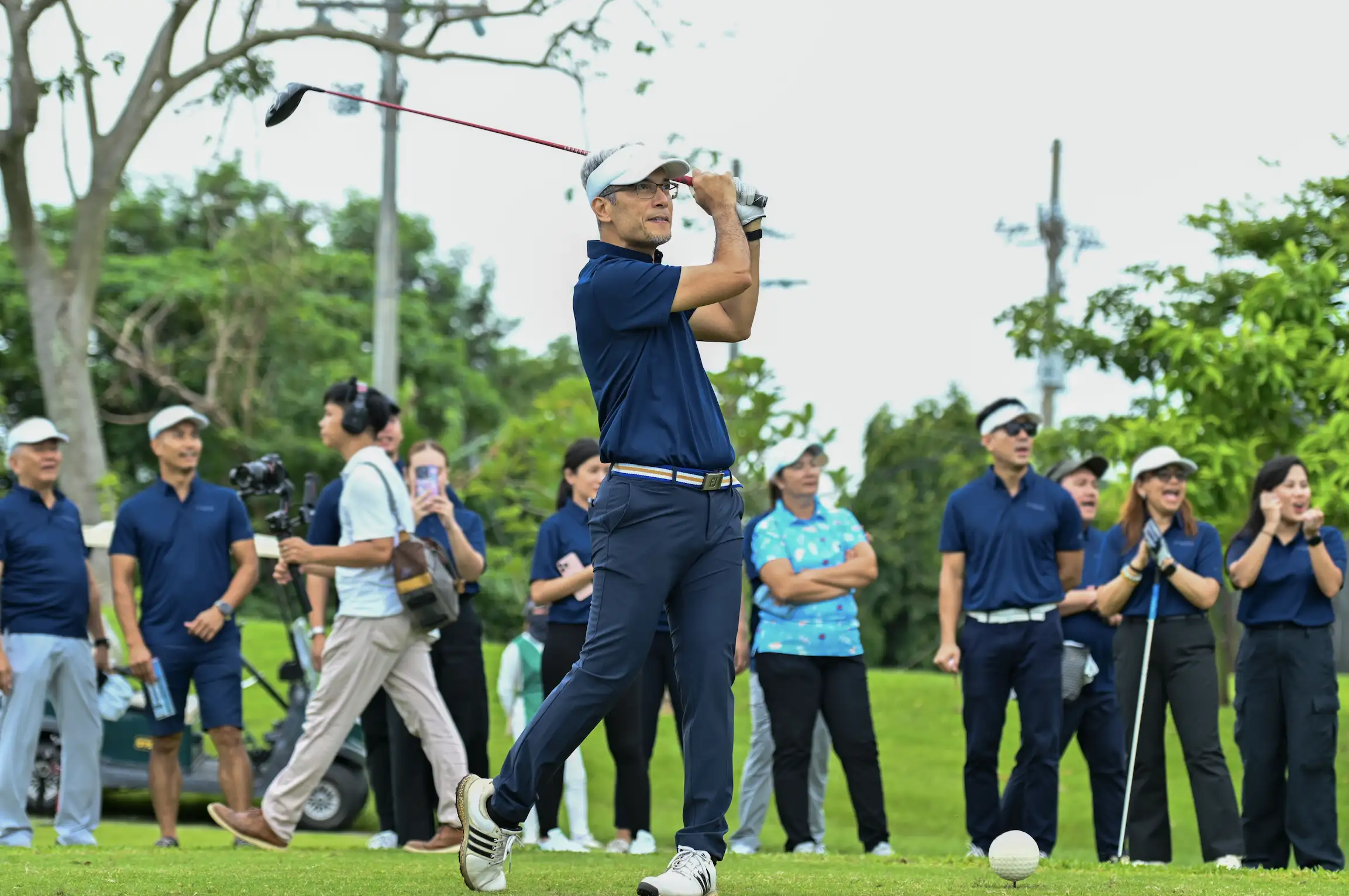 Eastern Communications Co-Coordinator Atty. Aileen Regio teeing off at ...
